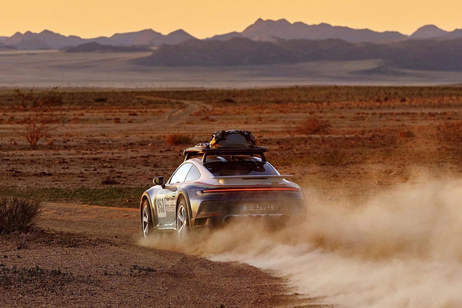 The new Porsche Design Chronograph 1 - 911 Dakar and 911 Dakar Rally ...